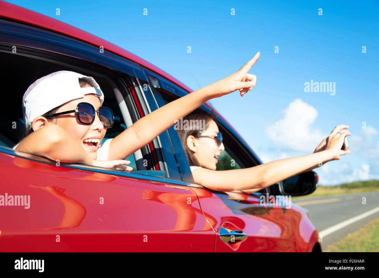 Happy mother and daughter enjoy road trip Stock Photo - Alamy