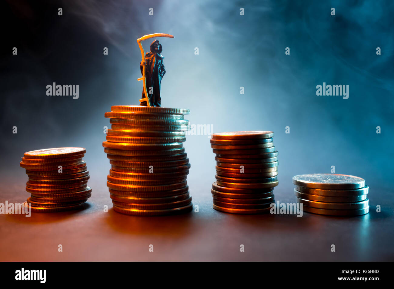 Grim reaper with pile of cash symbolizing the evil of money Stock Photo ...