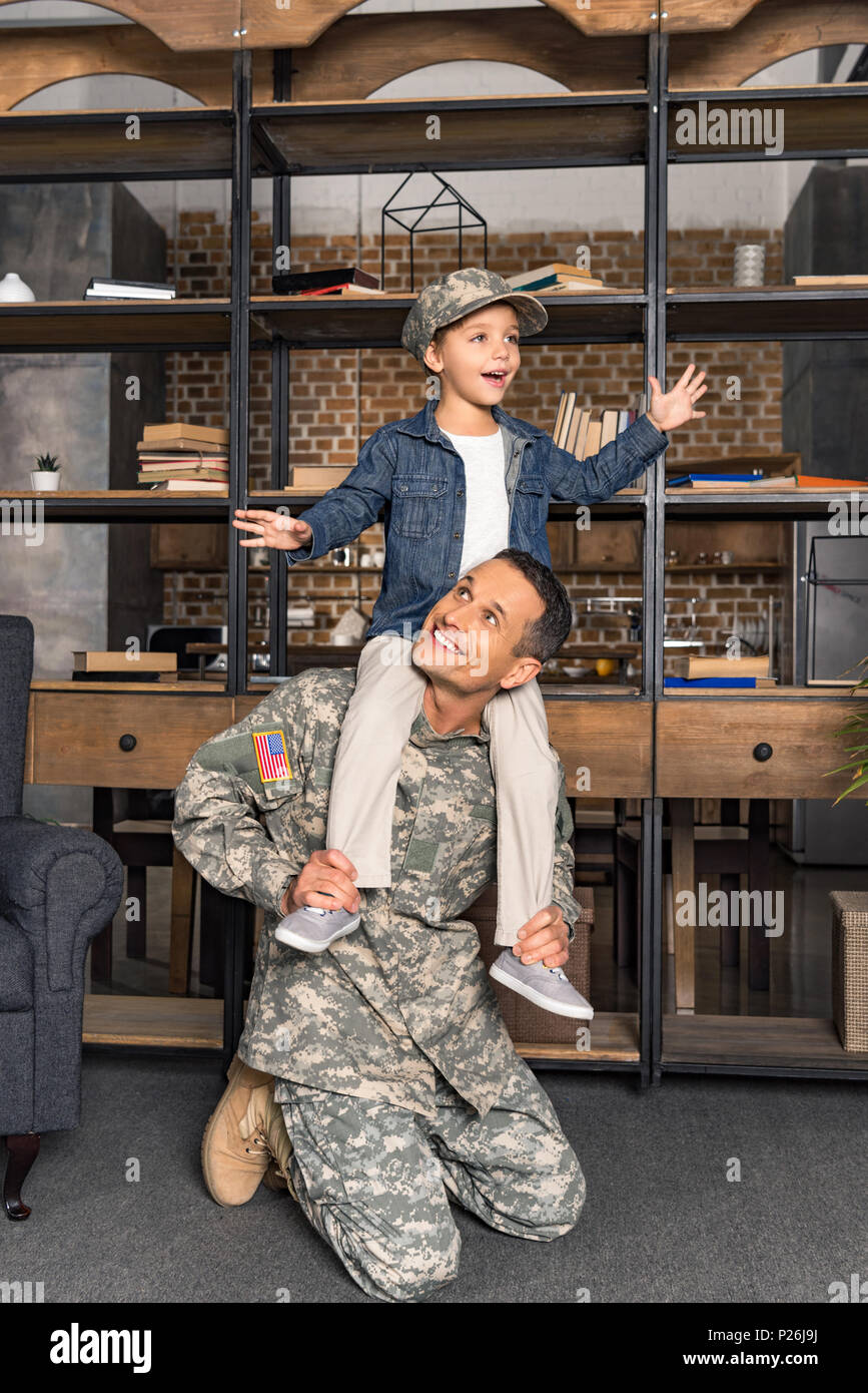 Military kid on parent shoulders hi-res stock photography and images ...