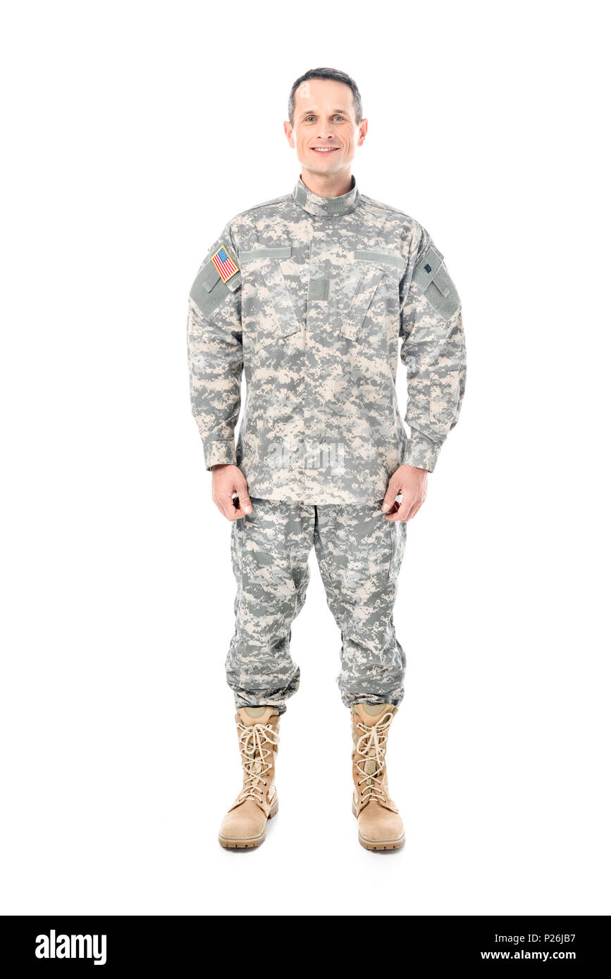 smiling american soldier in military uniform looking at camera isolated ...