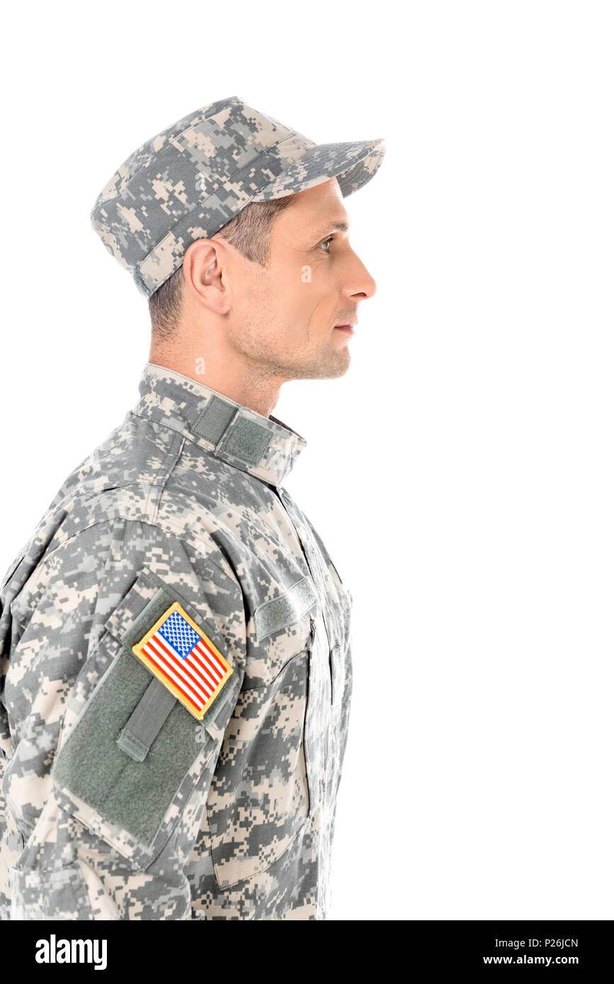 side view of soldier in military uniform looking away isolated on white ...