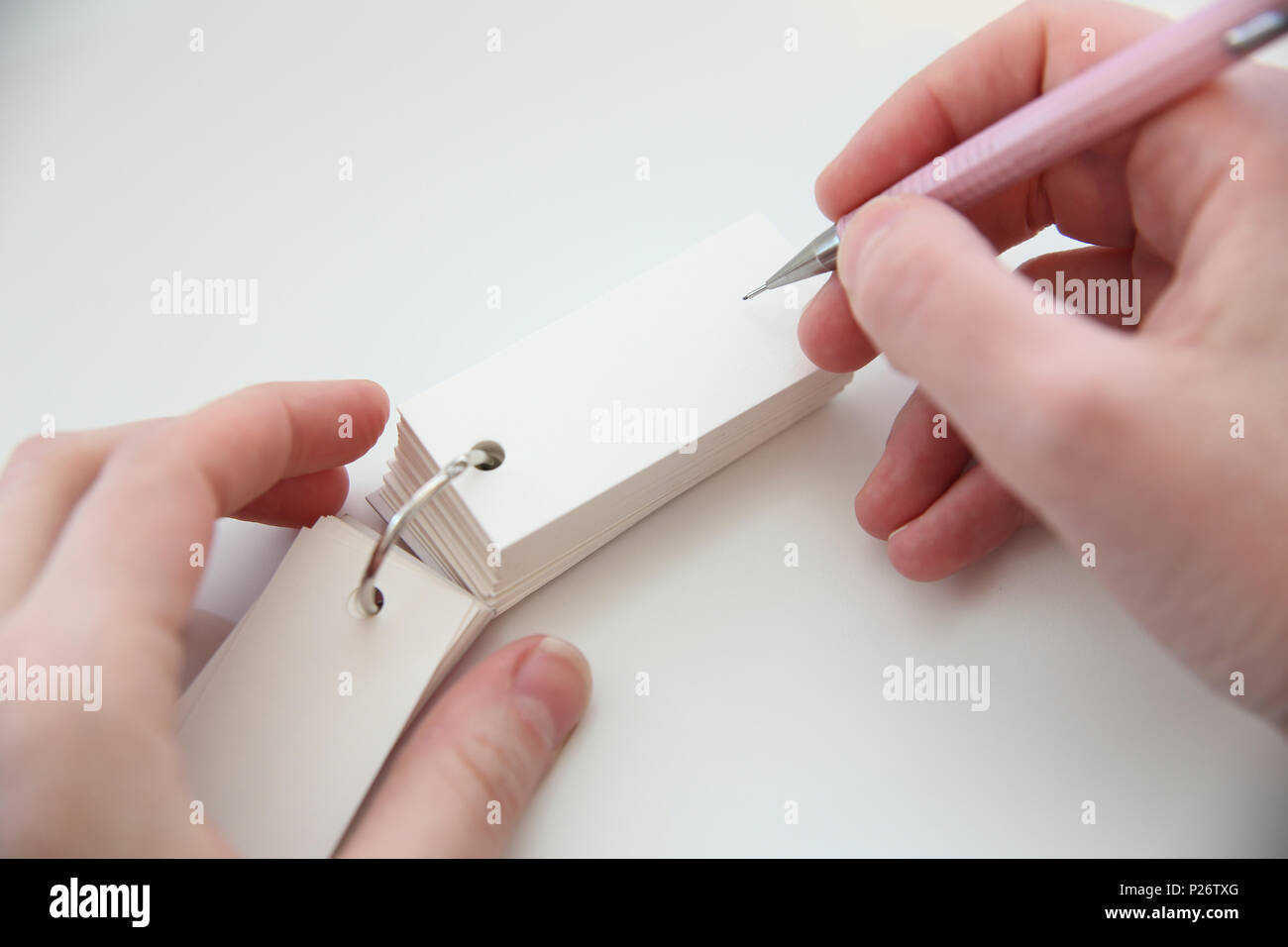 Writing in a white flashcard Stock Photo - Alamy