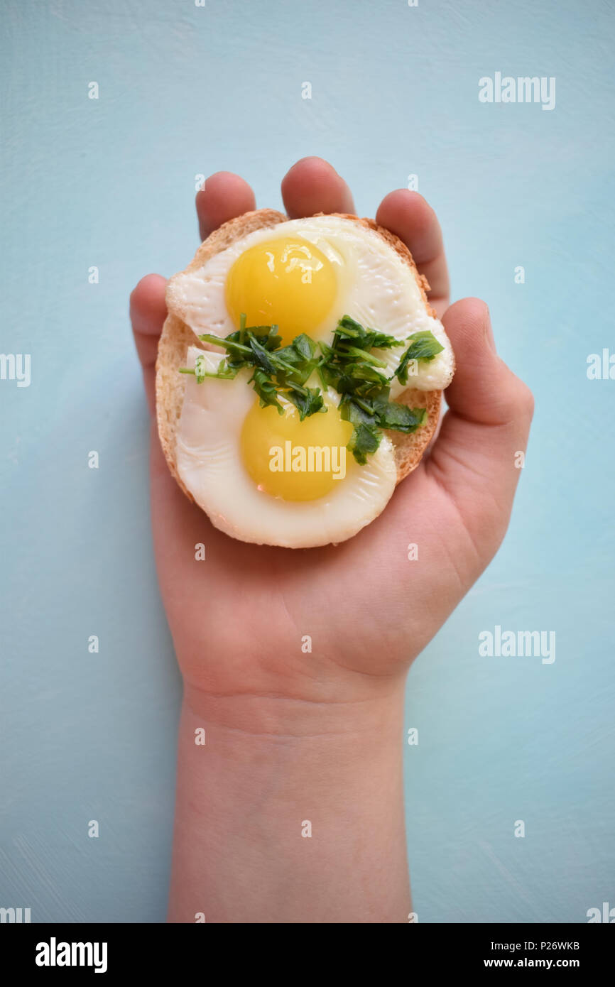hand and eggs Stock Photo - Alamy