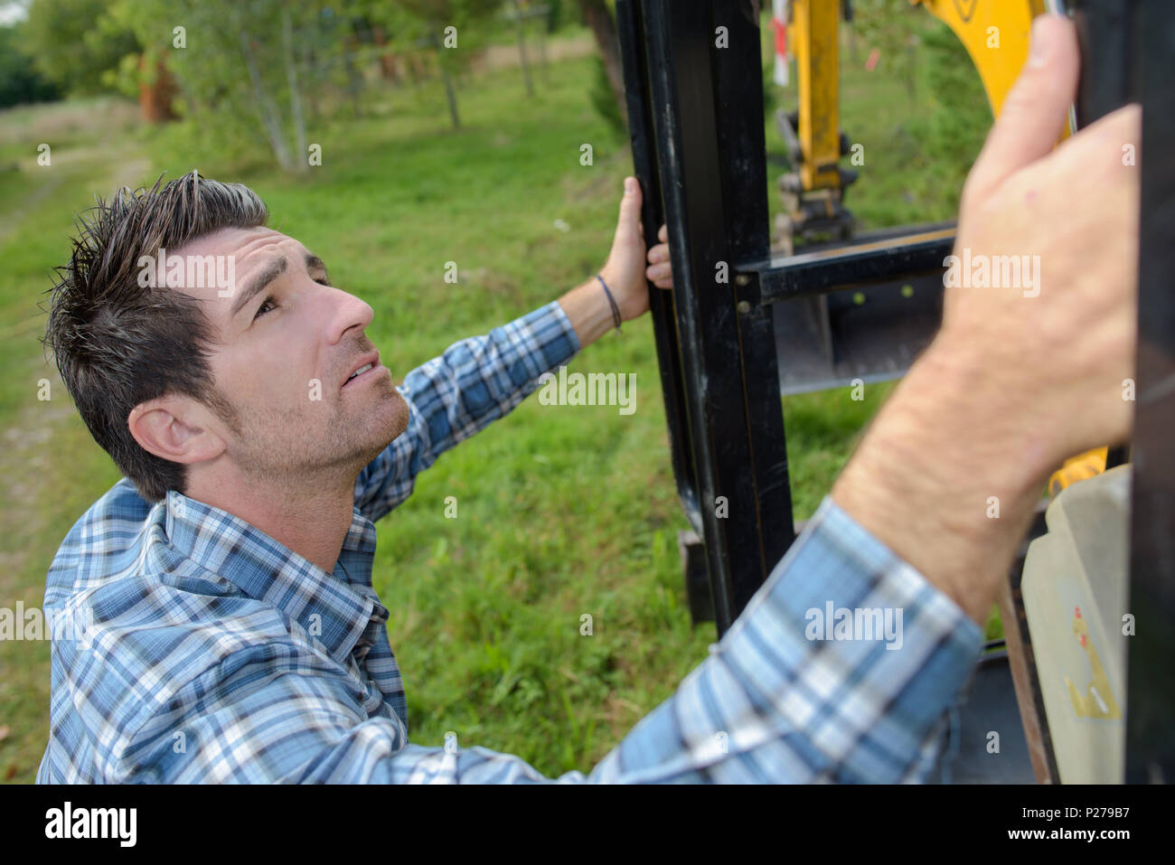 operating an excavator Stock Photo - Alamy