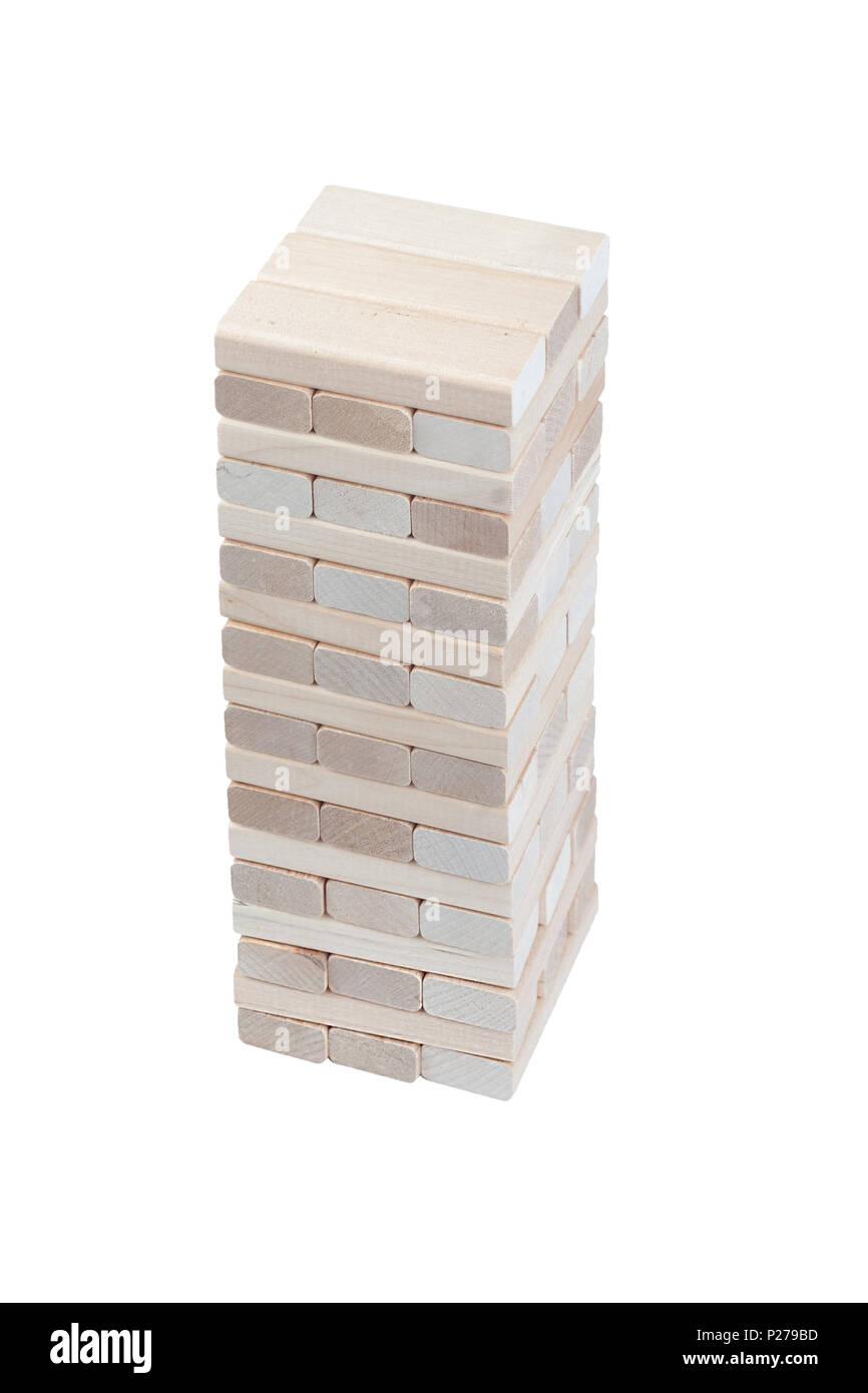 Wooden blocks tower isolated on white background. desktop game closeup ...