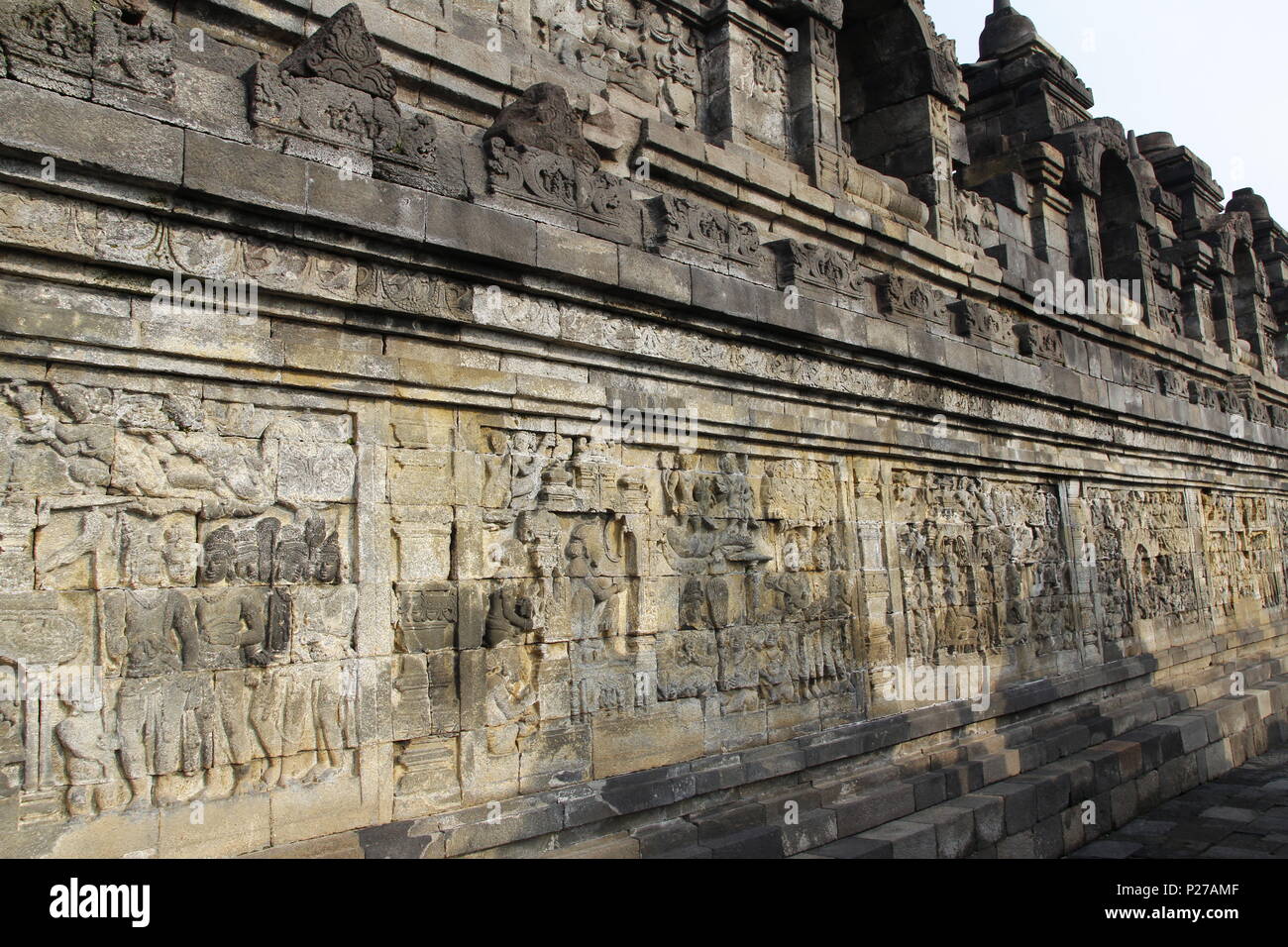 Beautiful bas-relief wall decor carved in stone at Borobudur Temple ...