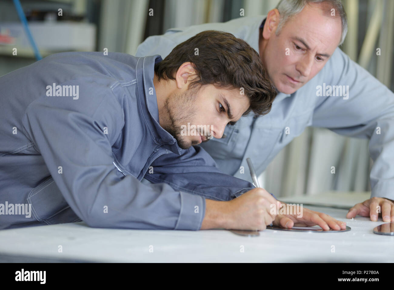 engineer is working on construction plan on his table Stock Photo - Alamy