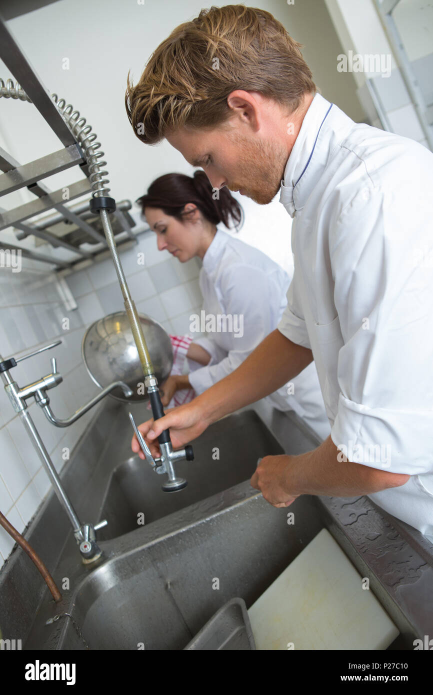 Professional cooks cooking dishes and food hi-res stock photography and ...