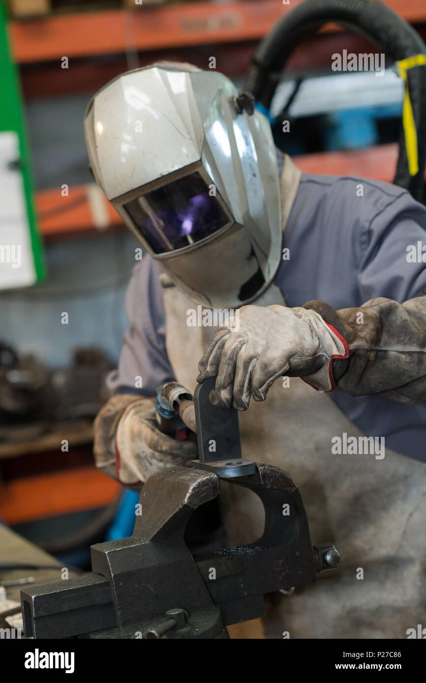 welding man welding pipe in industry Stock Photo - Alamy