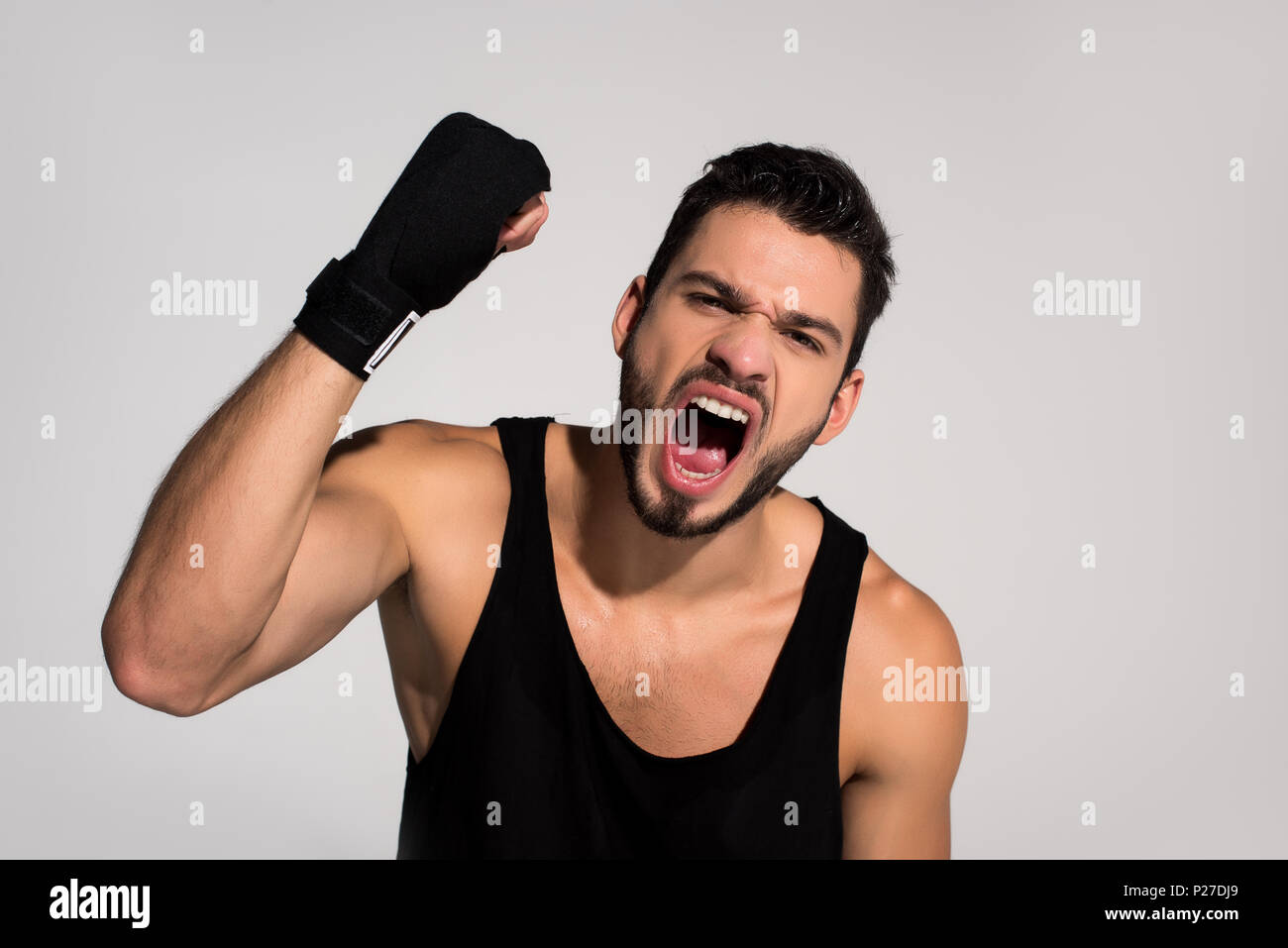 angry young fighter screaming at camera Stock Photo - Alamy