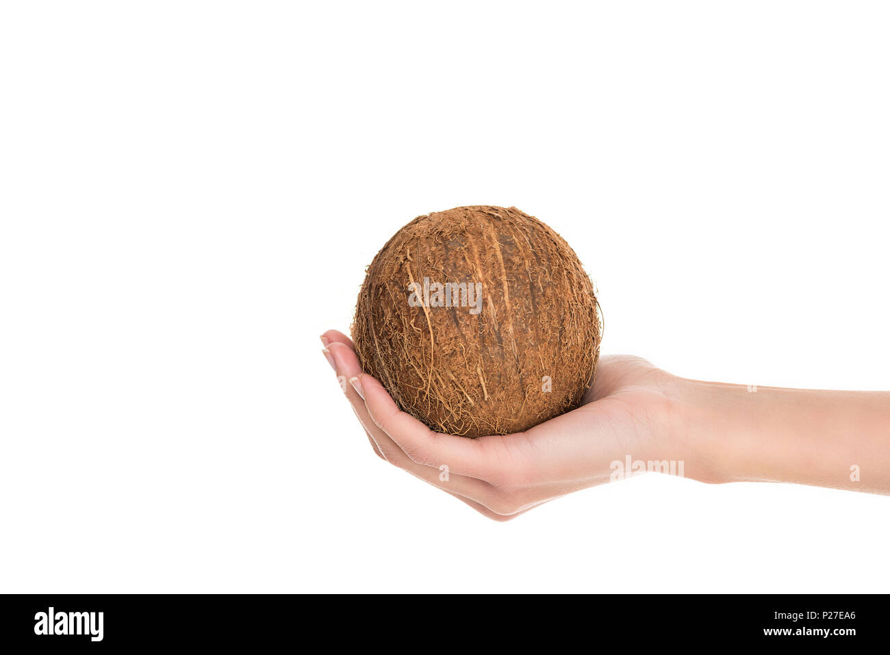 Coconut in hand hi-res stock photography and images - Alamy