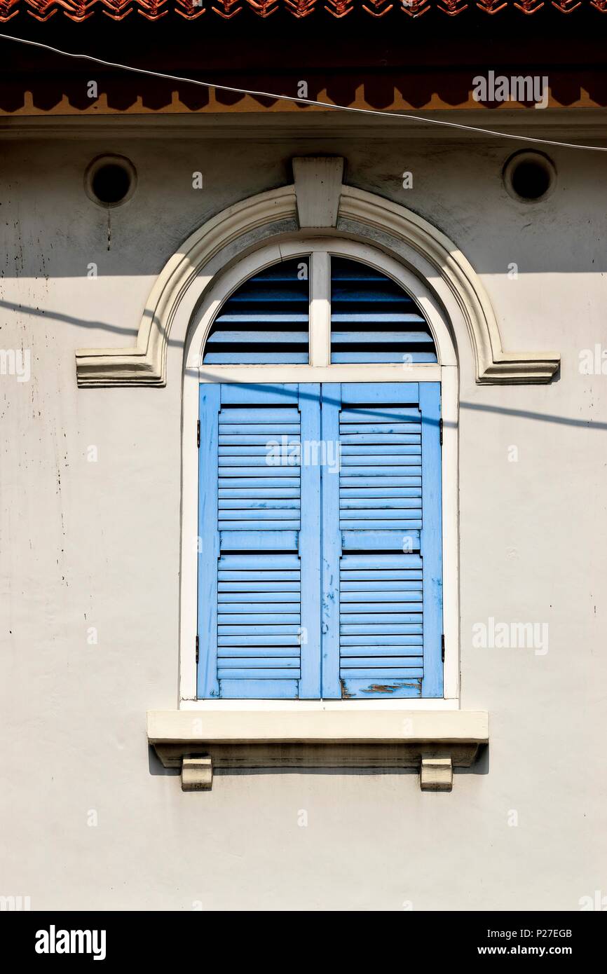Vertical view of traditional vintage Singapore shop house with antique ...