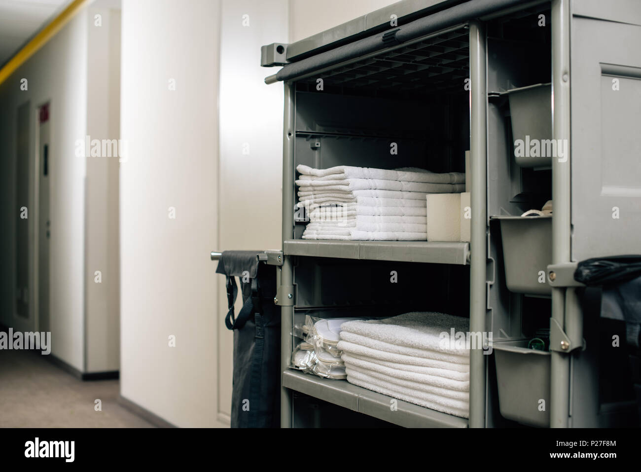 housekeeping cart with clean towels at hotel Stock Photo - Alamy