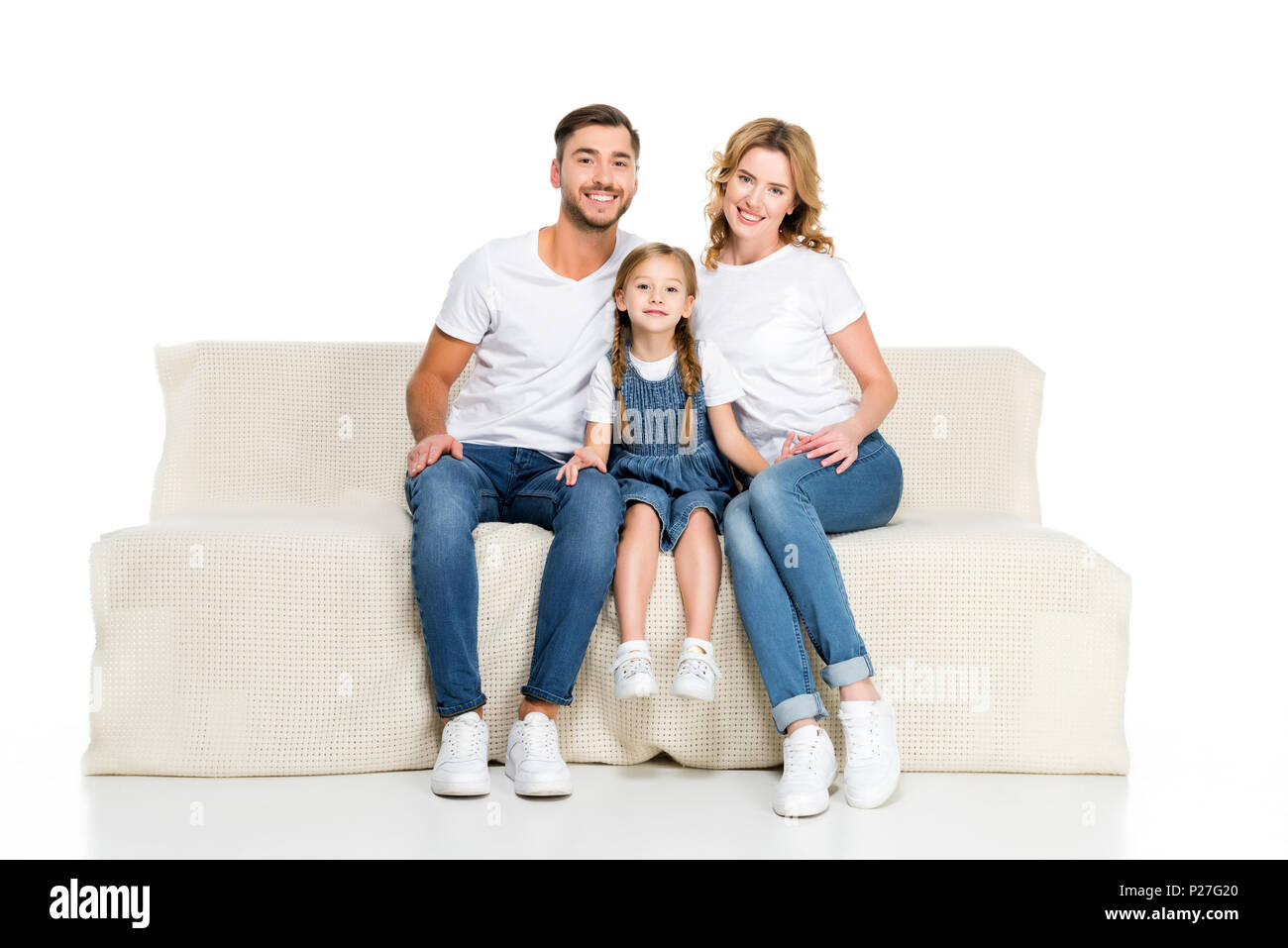 happy european family sitting on sofa, isolated on white Stock Photo ...