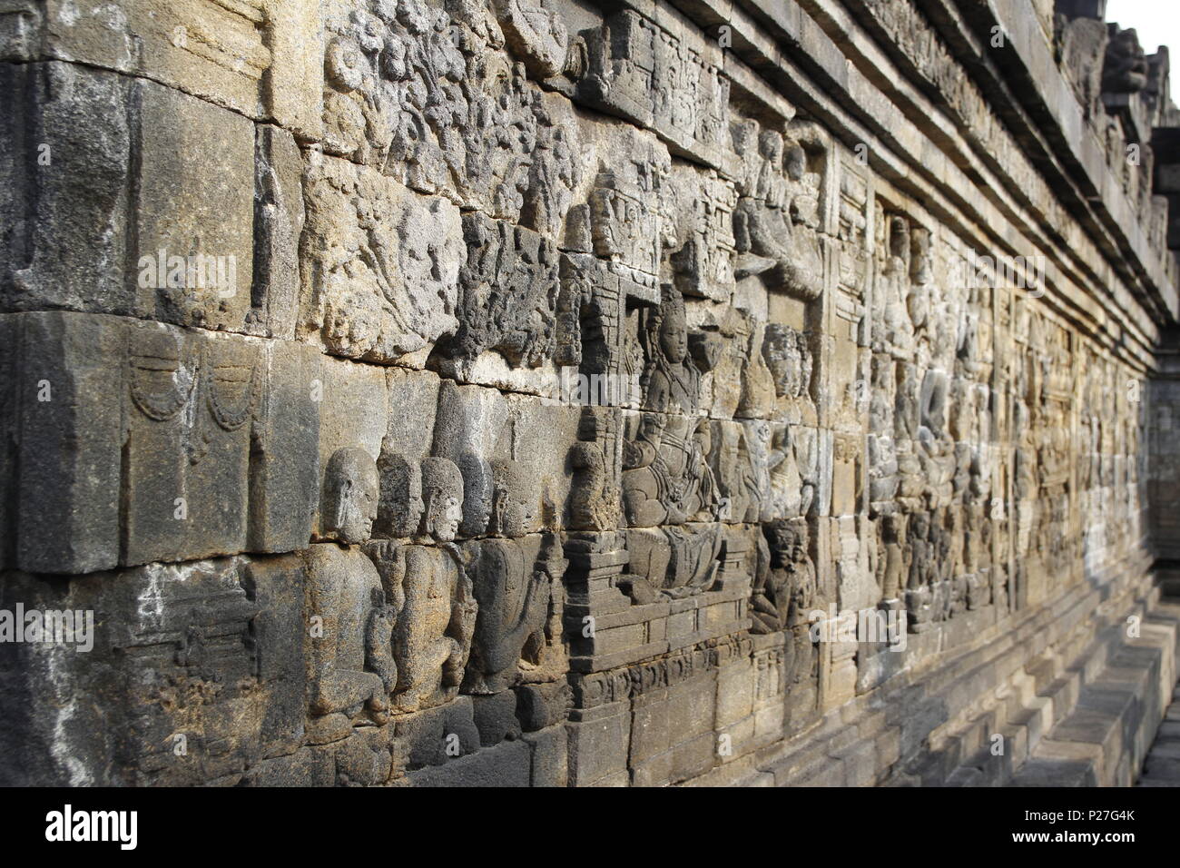 Beautiful bas-relief wall decor carved in stone at Borobudur Temple ...
