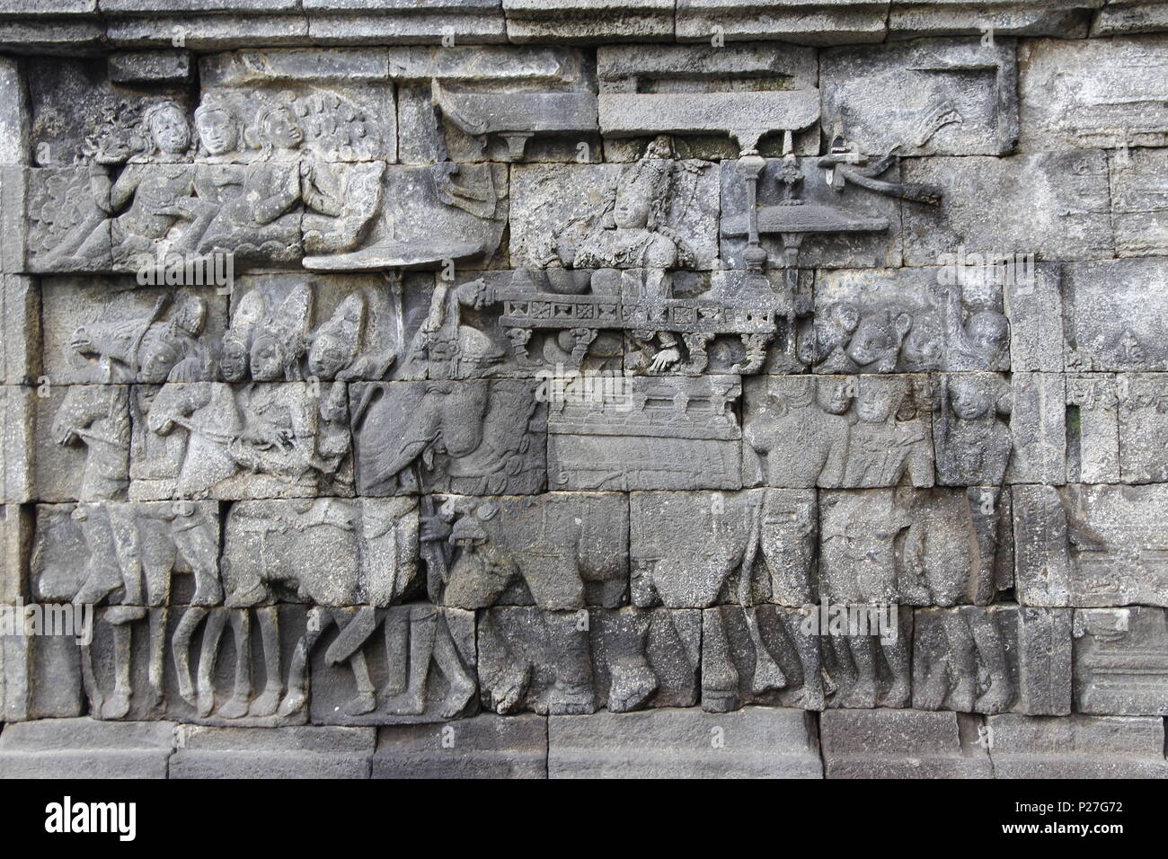 Beautiful bas-relief wall decor carved in stone at Borobudur Temple ...