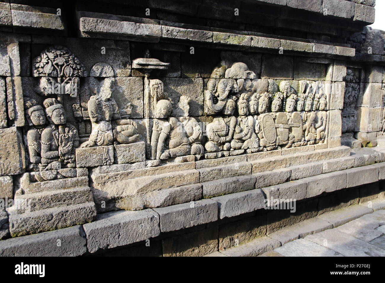 Beautiful bas-relief as wall decor carved in stone at Borobudur Temple ...