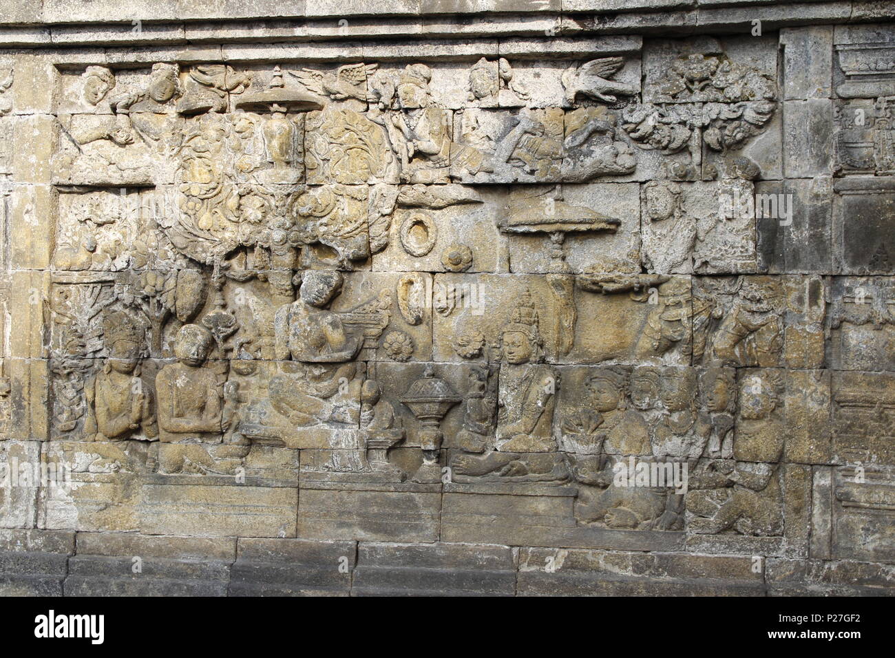 Beautiful bas-relief as wall decor carved in stone at Borobudur Temple ...