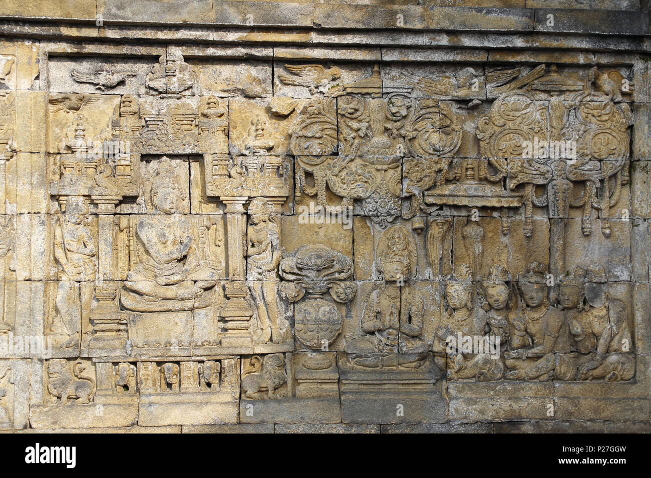 Beautiful bas-relief as wall decor carved in stone at Borobudur Temple ...
