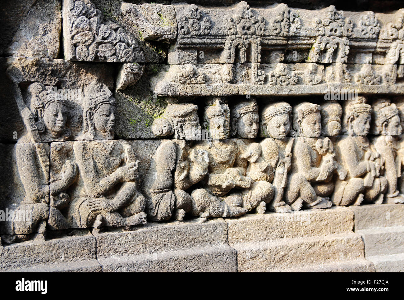 Beautiful bas-relief as wall decor carved in stone at Borobudur Temple ...