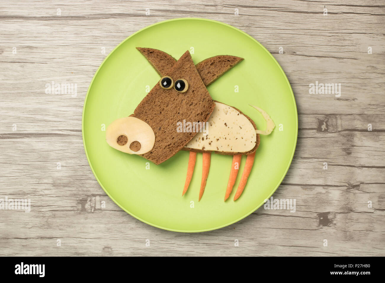 Funny pig made with food ingredients on plate Stock Photo - Alamy