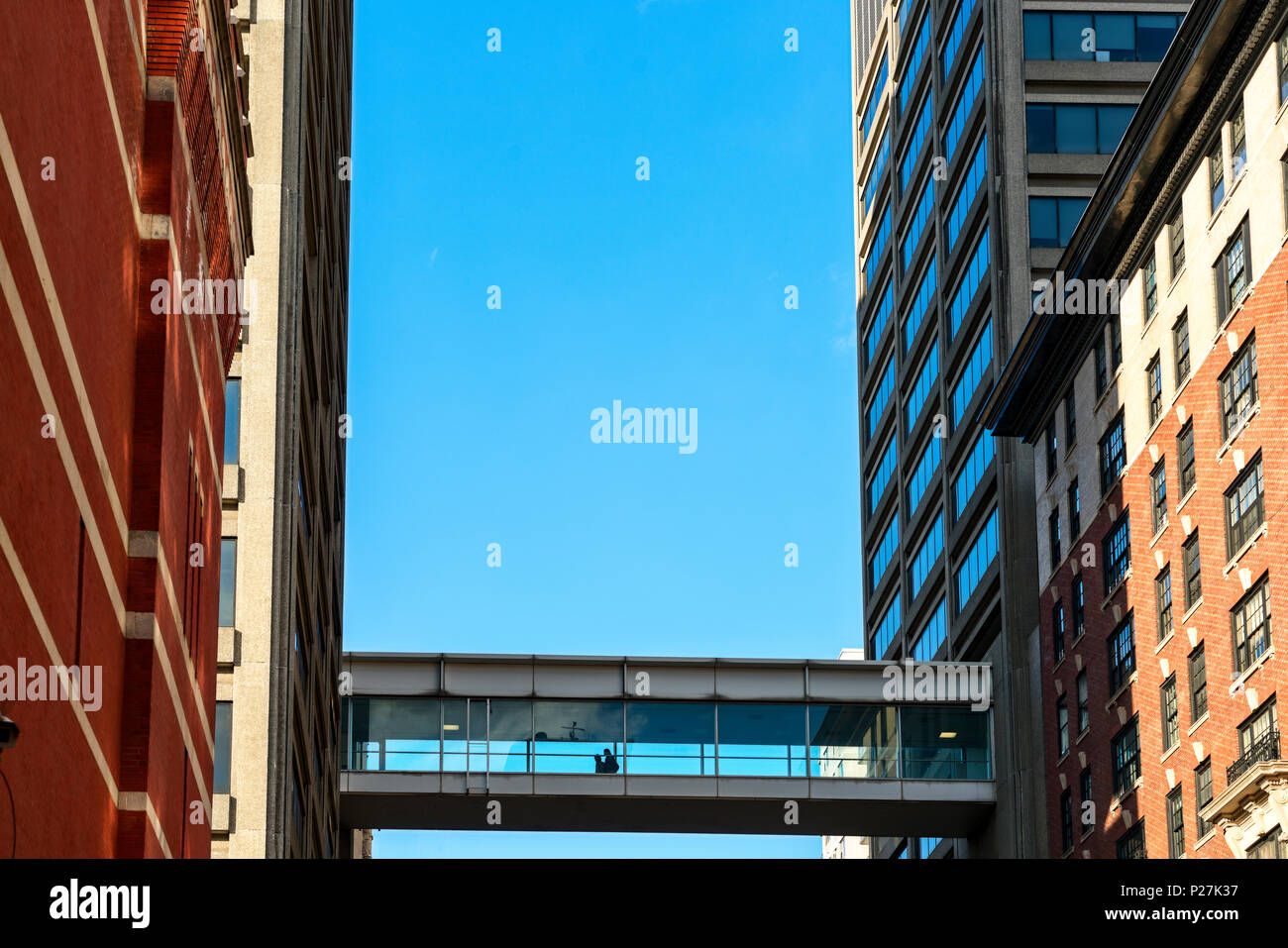 Looking up at the sky through tall buildings hi-res stock photography ...