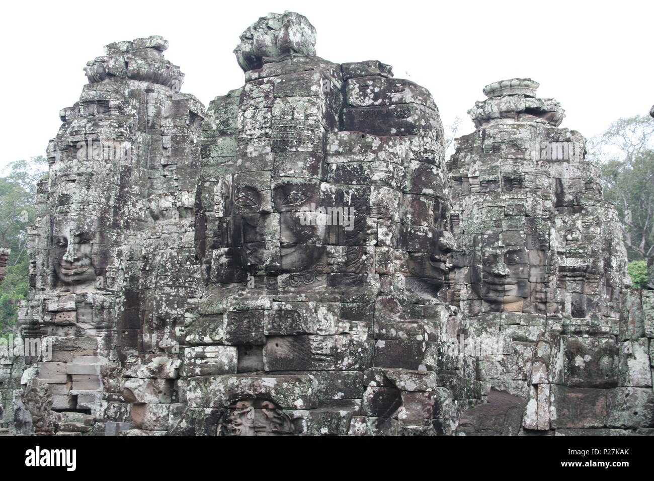 Faces of gods carved on stone at Angkor Wat, Siem Reap Cambodia Stock ...