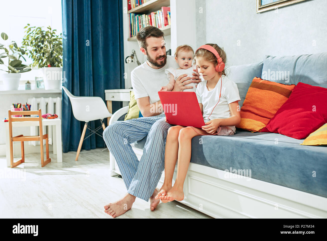 father and his daughters at home Stock Photo - Alamy