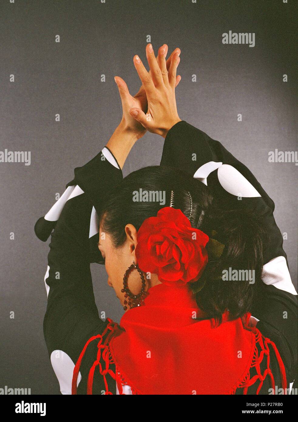 Flamenco woman, back turned, in a clapping hand position Stock Photo ...