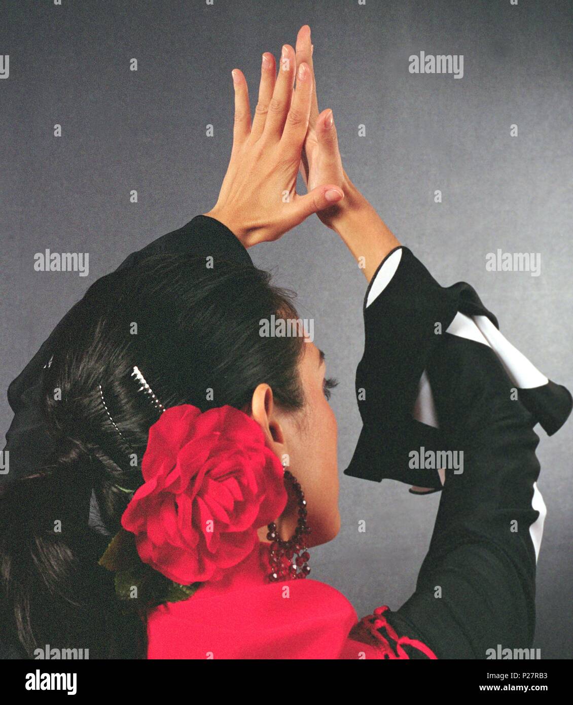 Flamenco woman, back turned, in a clapping hand position Stock Photo ...