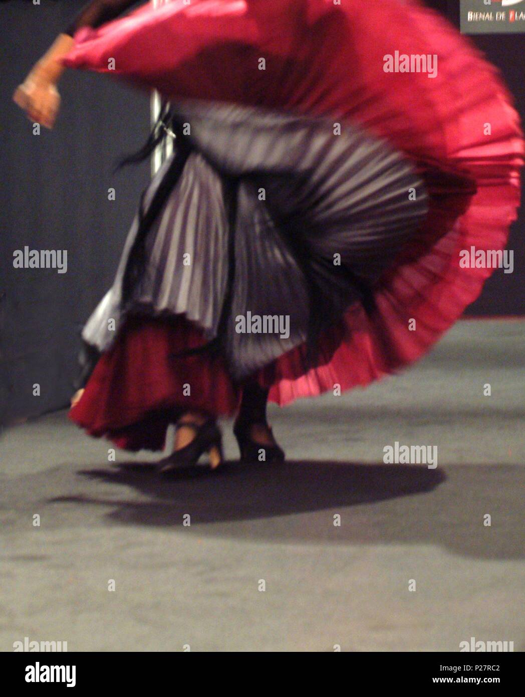 Flamenco dancer waving her dress Stock Photo - Alamy