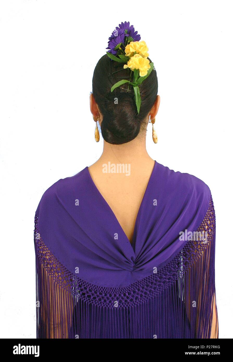 Flamenco dancer seen from behind in violet dress and shawl Stock Photo ...