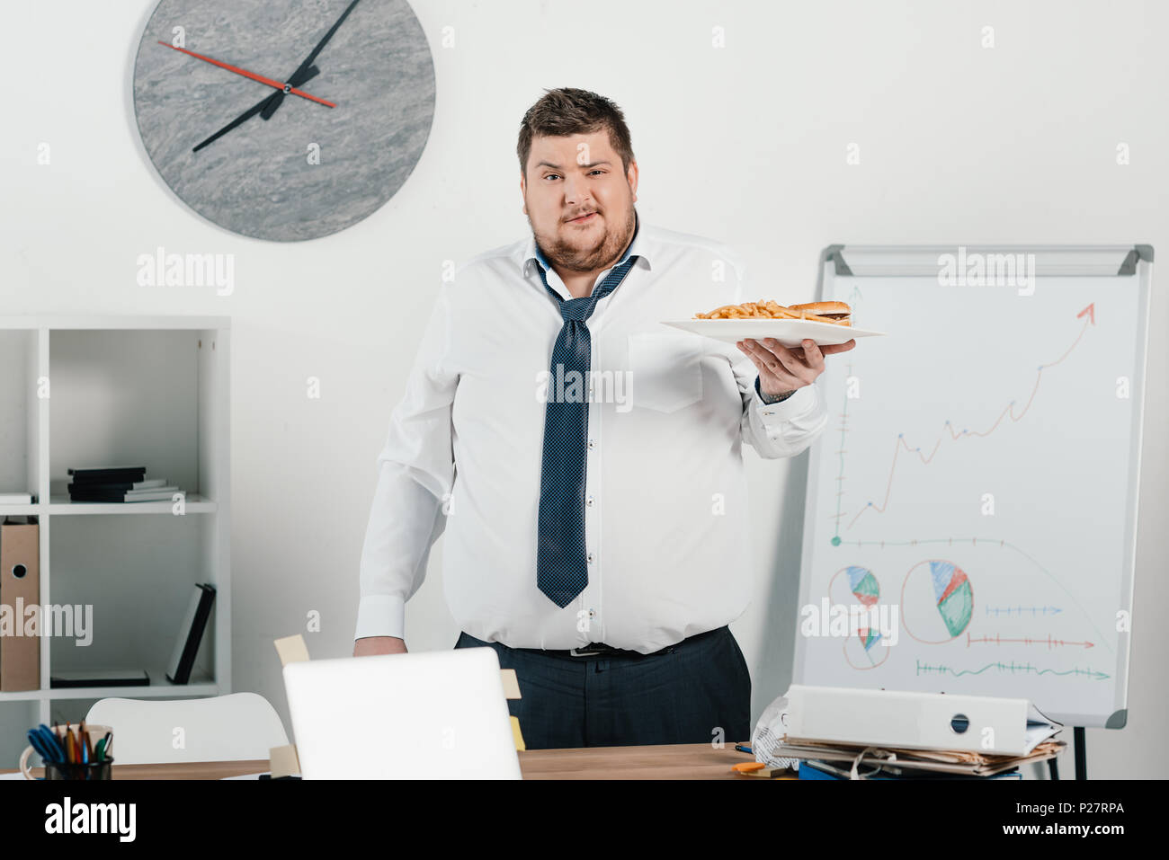 Fat businessman hi-res stock photography and images - Alamy