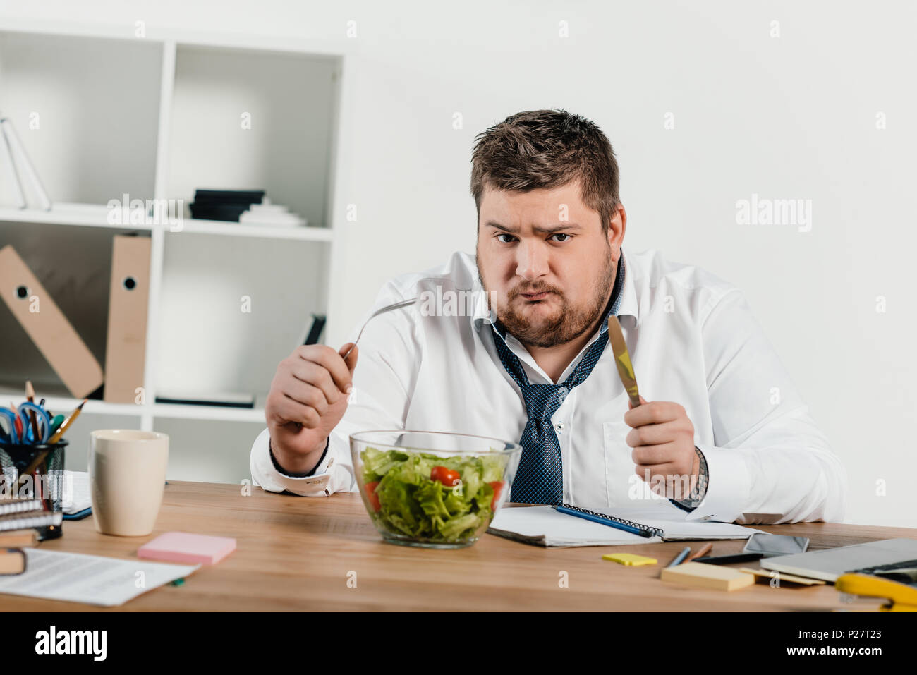 Man eating salad sad hi-res stock photography and images - Alamy