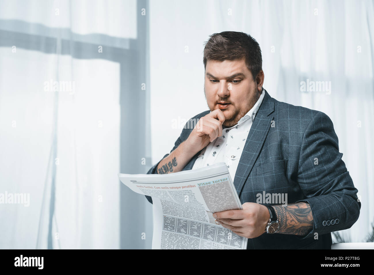 Fat Man Reading Newspaper High Resolution Stock Photography and Images ...