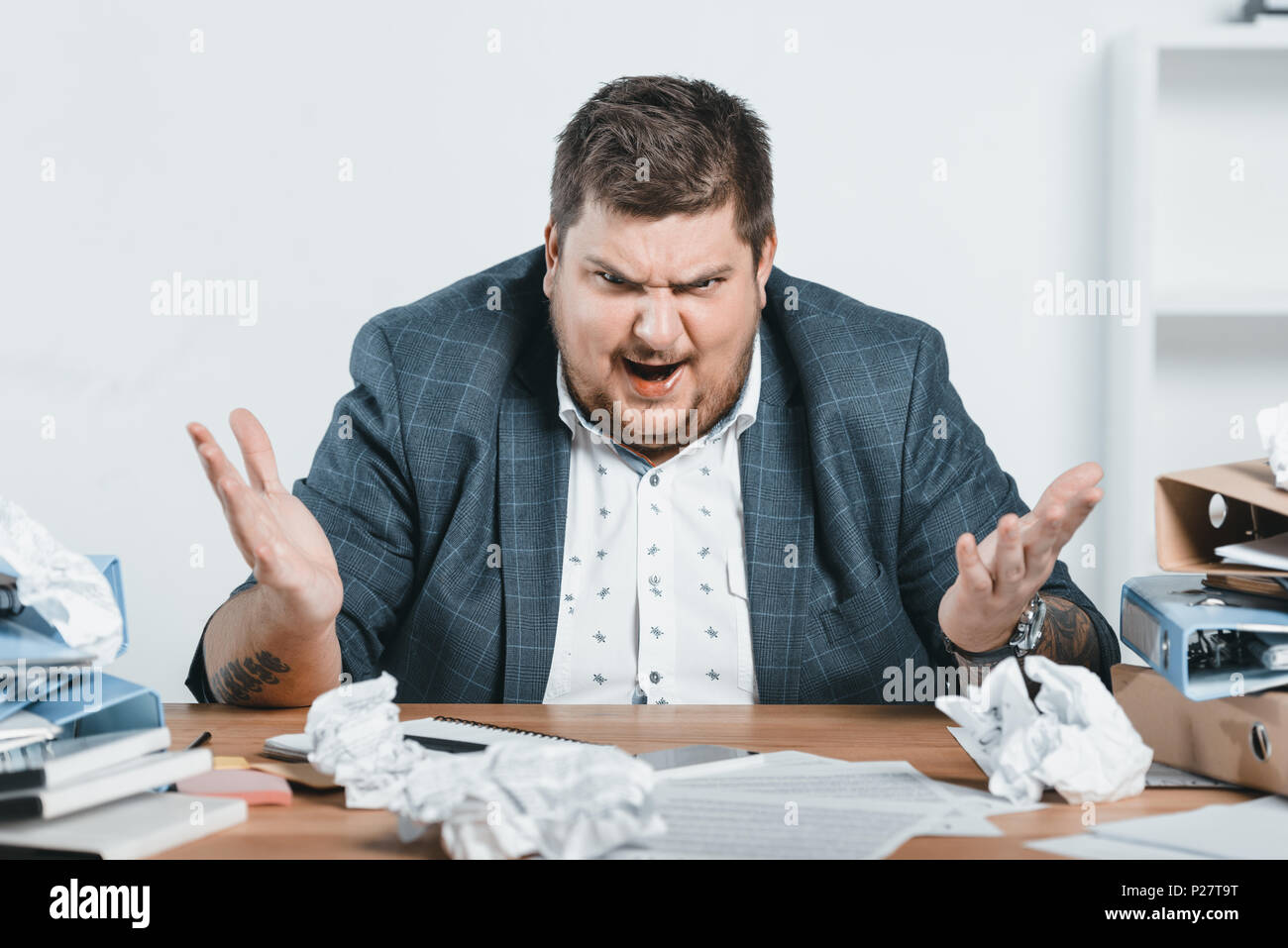 Angry fat man in suit hi-res stock photography and images - Alamy