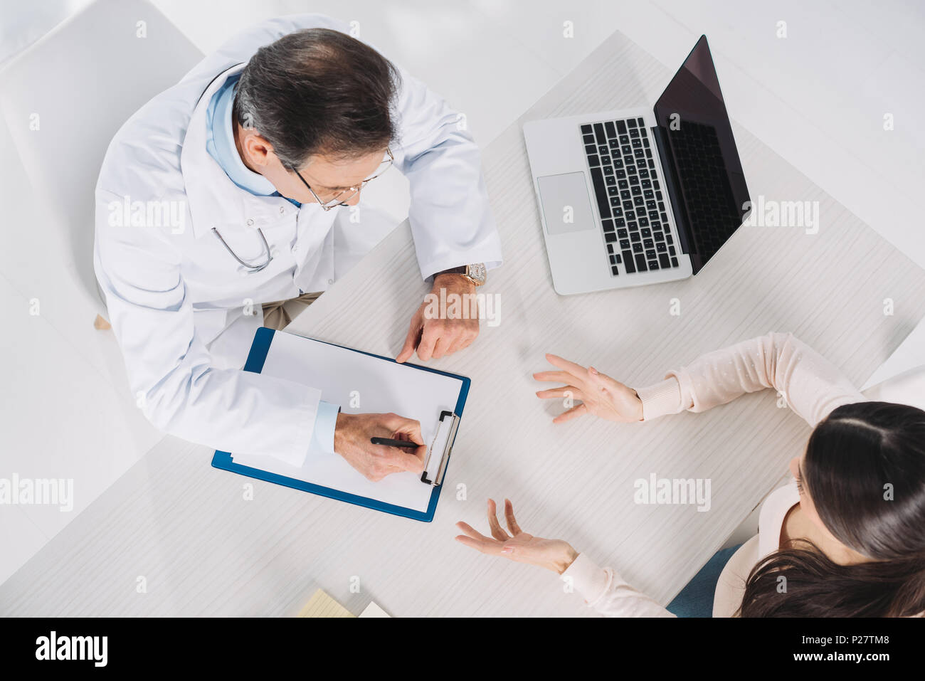 Overhead view mature doctor hi-res stock photography and images - Alamy