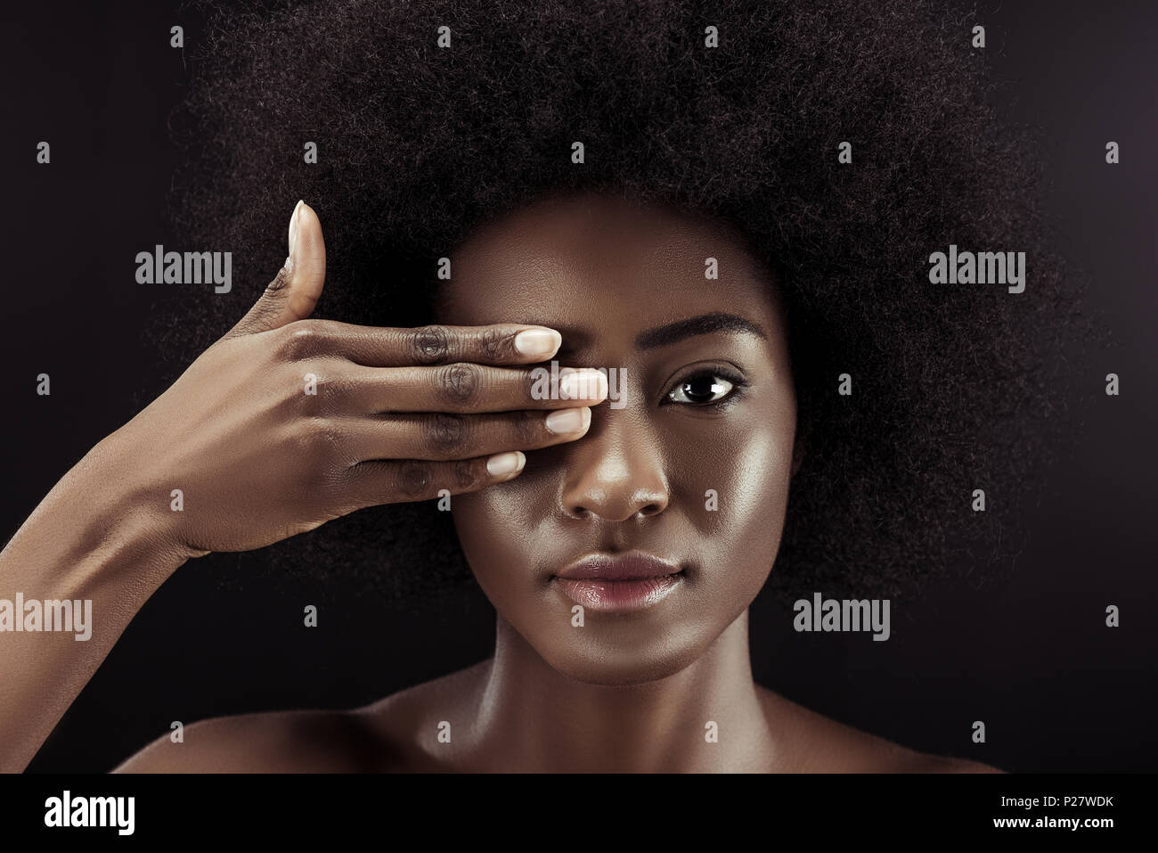 Woman covering eye with hand hi-res stock photography and images - Alamy