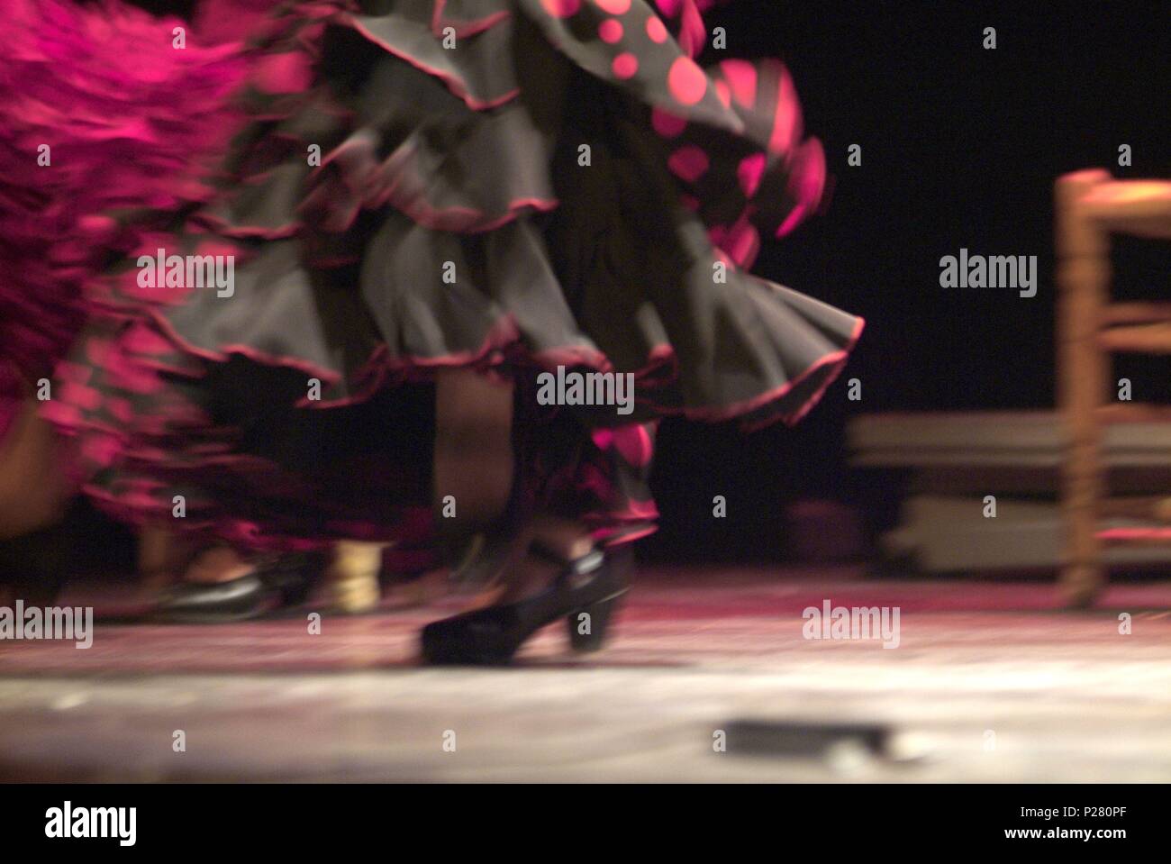 Flamenco dancer stamping hard on her heels Stock Photo - Alamy