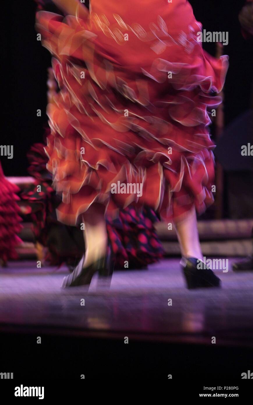 Flamenco dancer stamping hard on her heels Stock Photo - Alamy