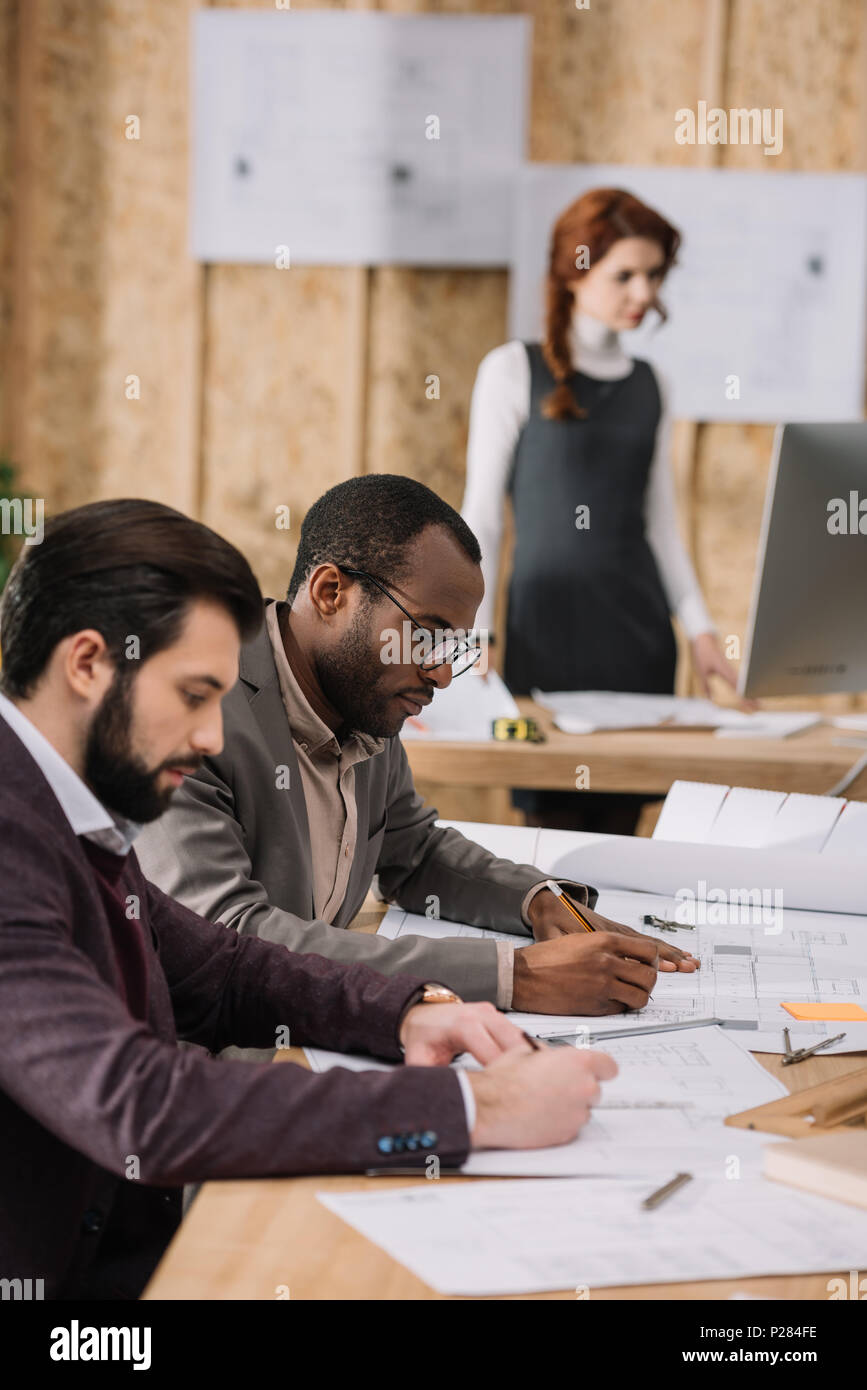 Attractive concentrated professional multiethnic male hi-res stock ...