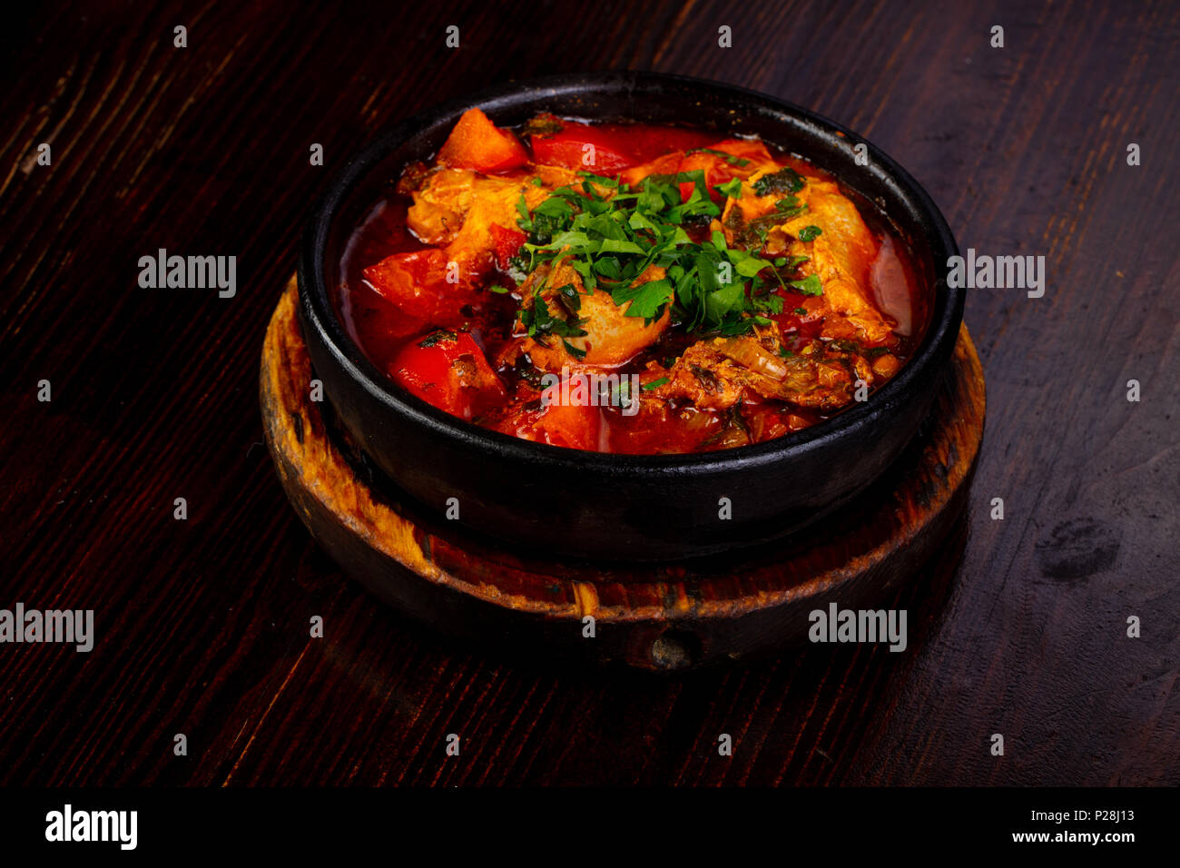 Georgian cuisine Chahohbili with chicken Stock Photo - Alamy