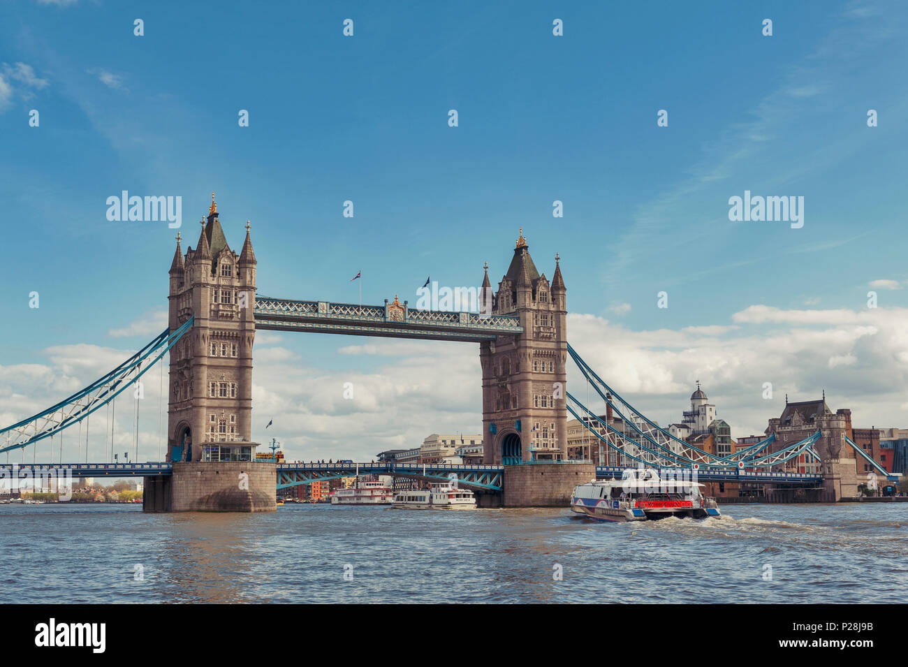 Tower Bridge, a combined bascule and suspension bridge with twin towers ...