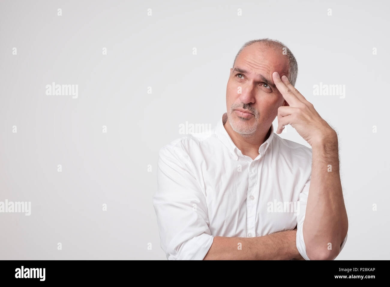Portrait man thinking white background hi-res stock photography and ...