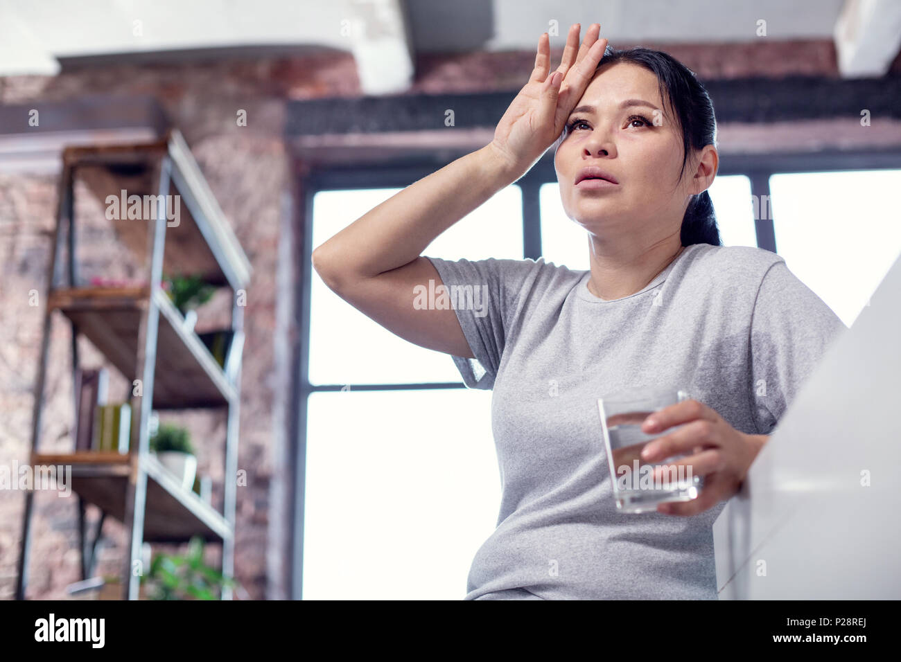 Miserable cold woman hi-res stock photography and images - Alamy