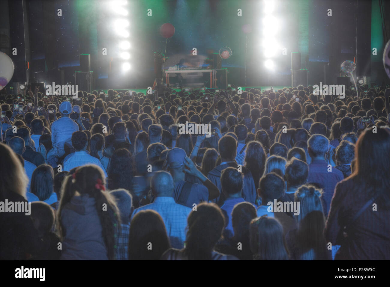 People at the concert are waiting for the show Stock Photo - Alamy