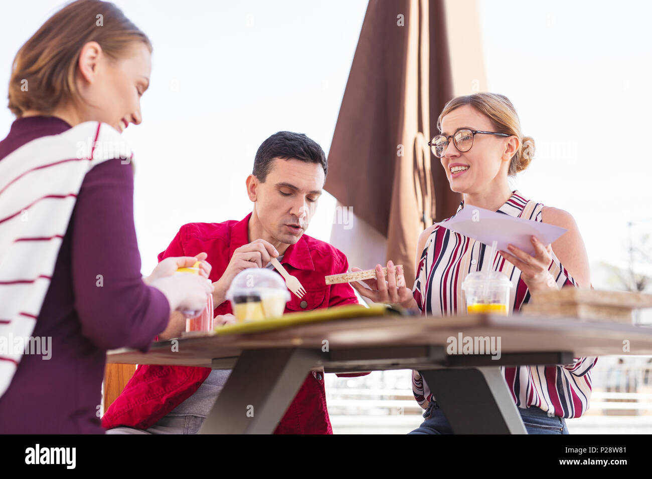 Three old friends meeting each other during lunch time Stock Photo - Alamy