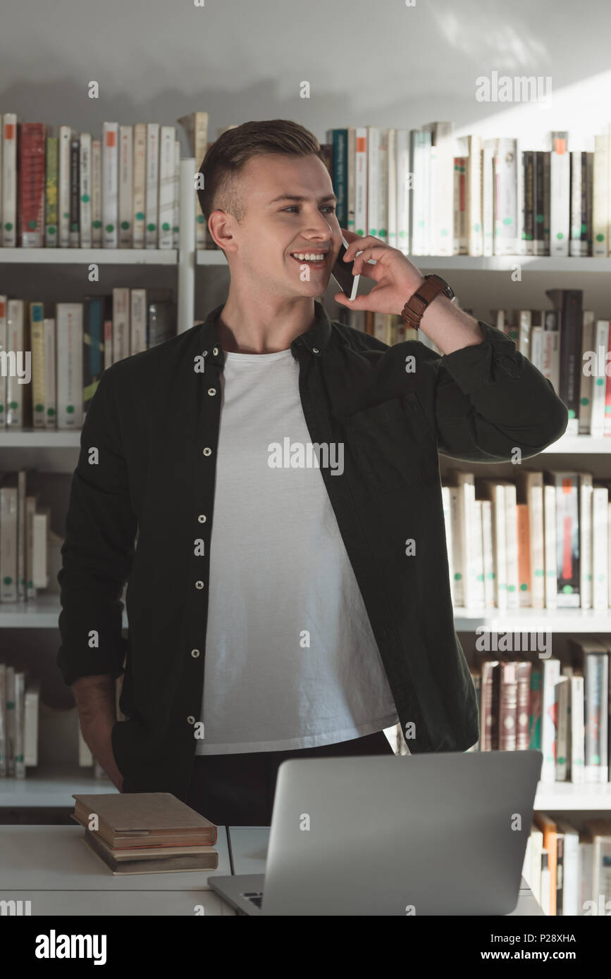 People talking books in library hi-res stock photography and images - Alamy