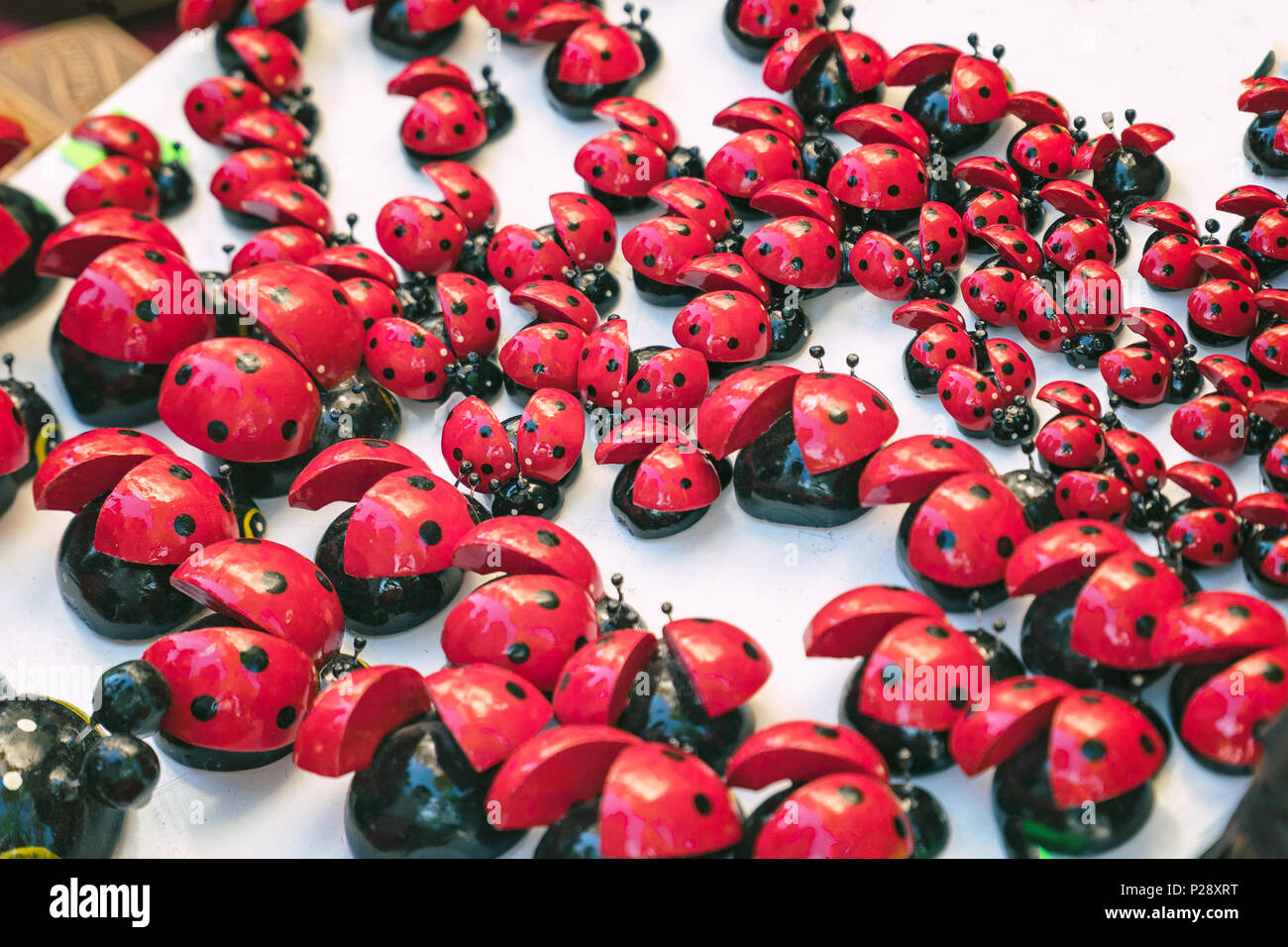 Many artificial lady bug toy Stock Photo - Alamy