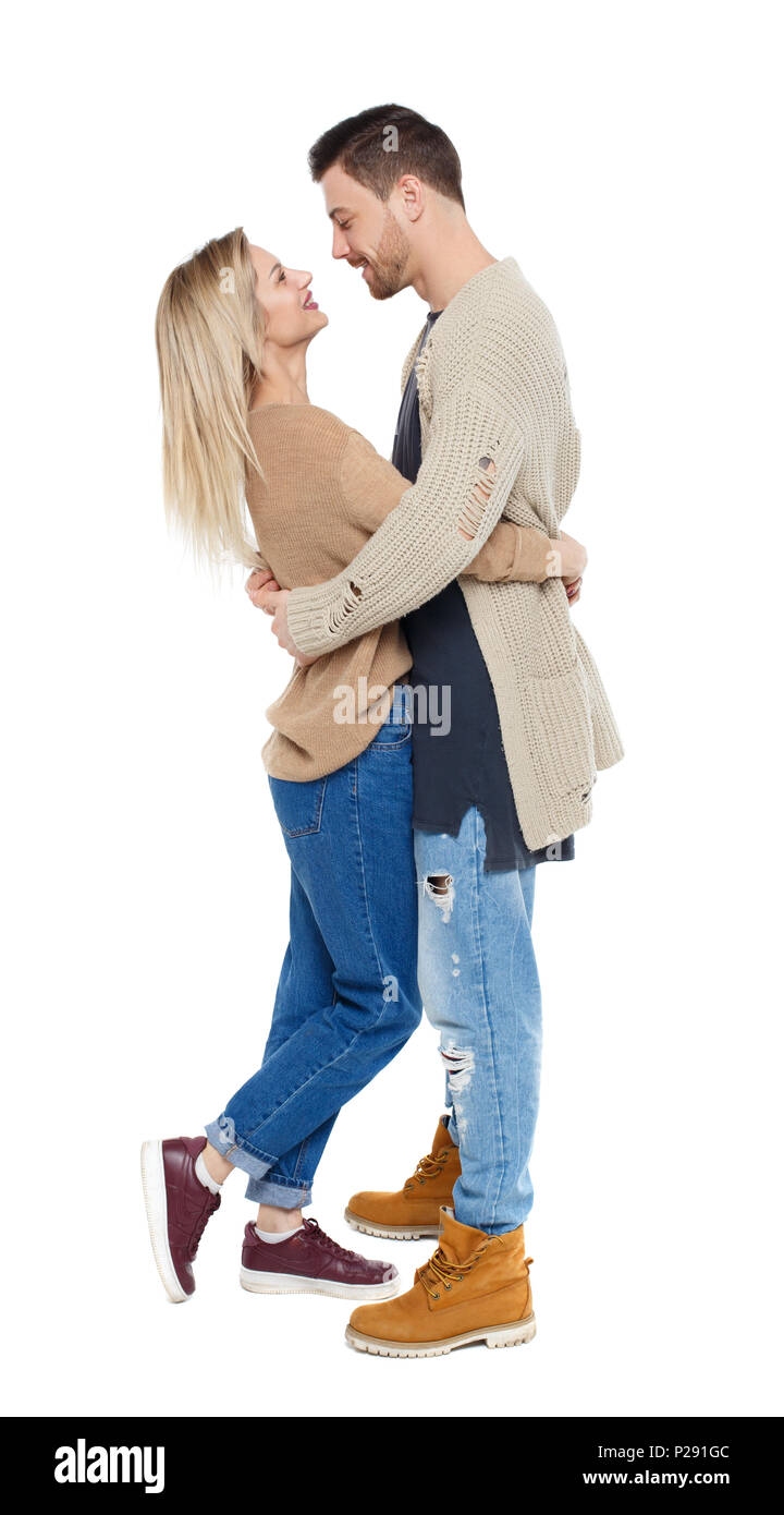 Side view of a stylish couple. beautiful friendly girl and guy together ...